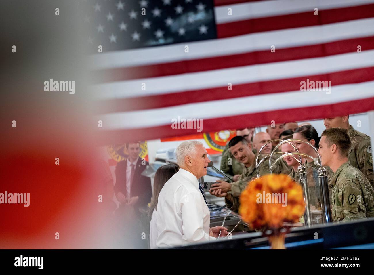 Vice President Mike Pence serves turkey to troops at Al Asad Air Base ...