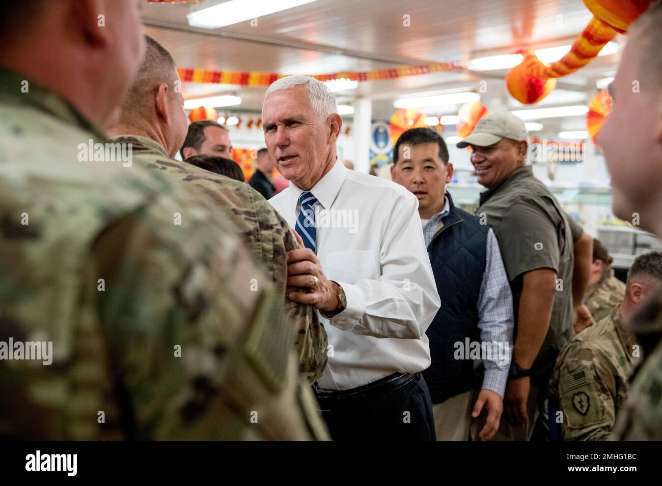 Vice President Mike Pence greets troops at a mess hall at Al Asad Air ...