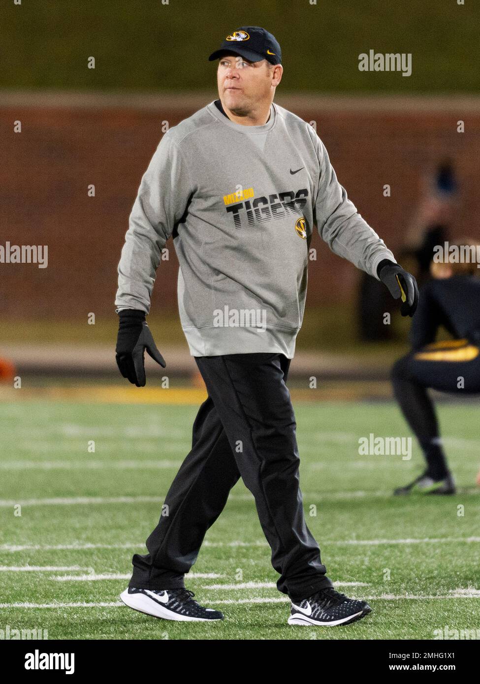 Missouri head coach Barry Odom watches his team warm up prior to the ...