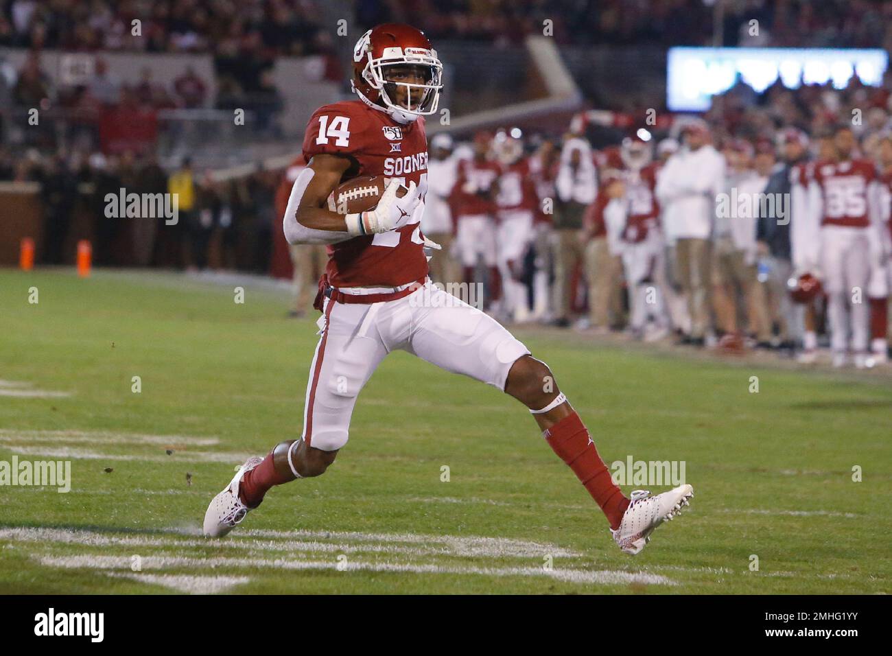 Oklahoma wide receiver Charleston Rambo (14) carries during an NCAA ...