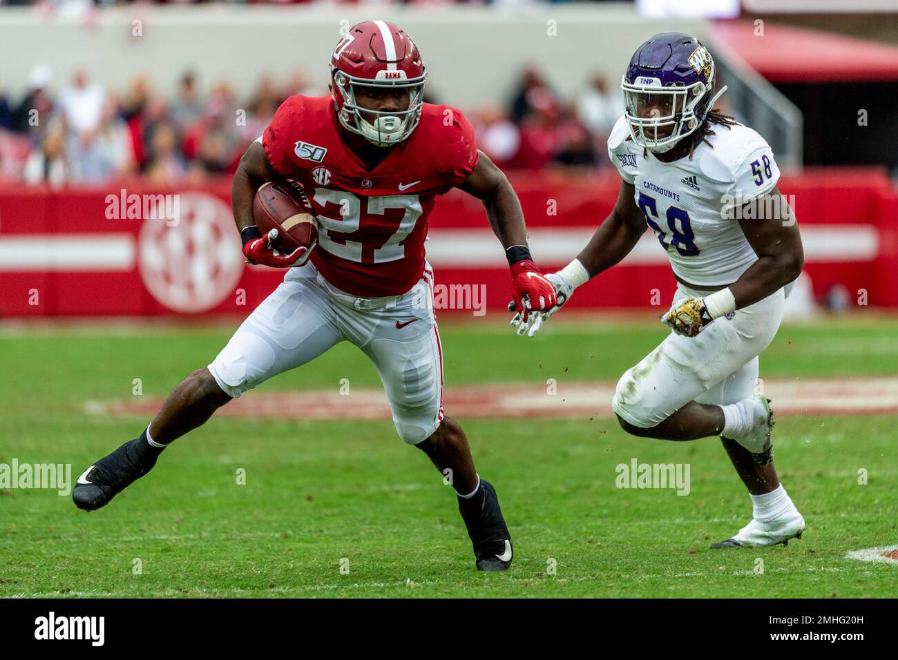 Alabama running back Jerome Ford (27) runs past Western Carolina ...