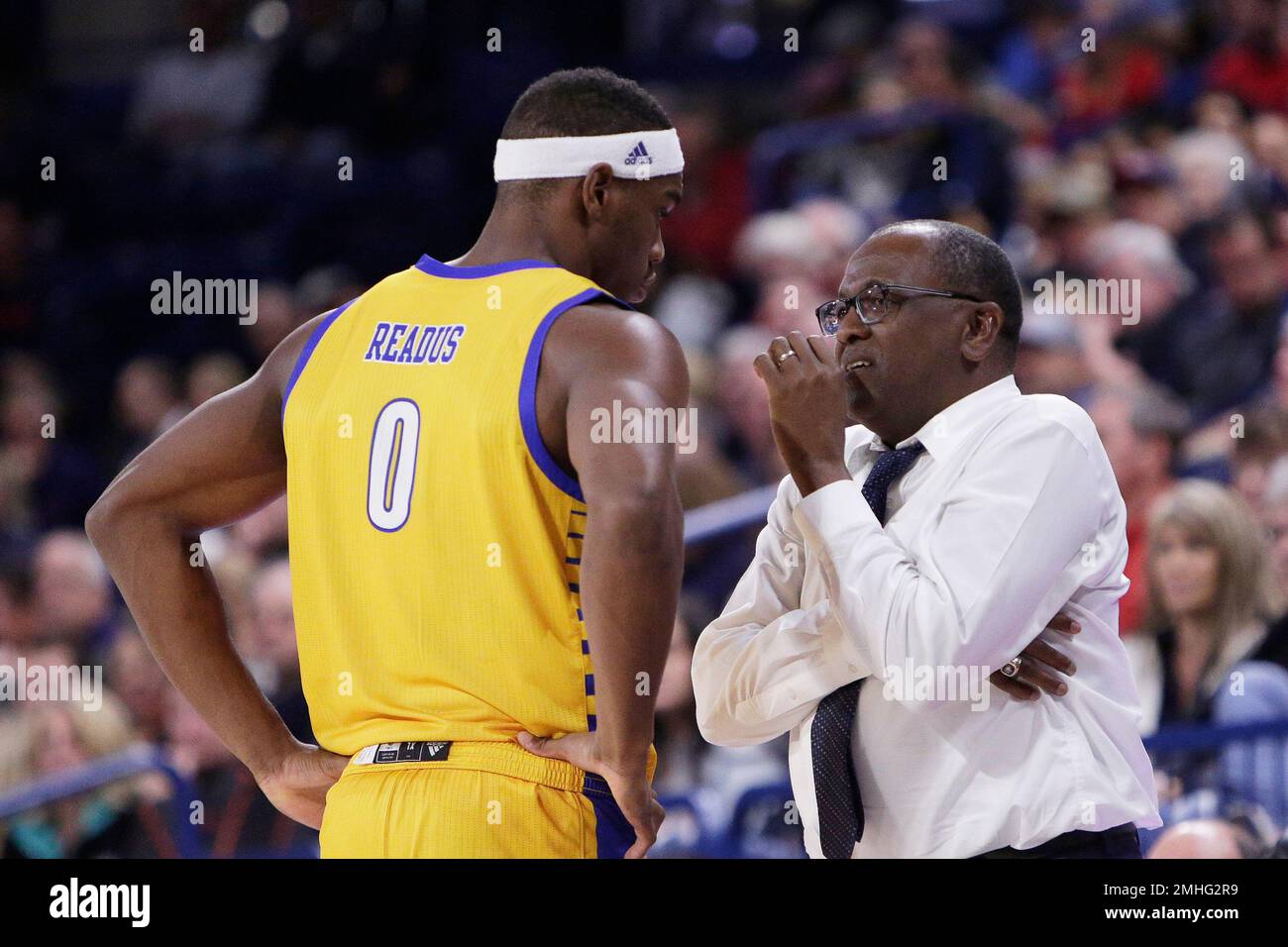 Cal State Bakersfield head coach Rod Barnes, right, speaks with center ...