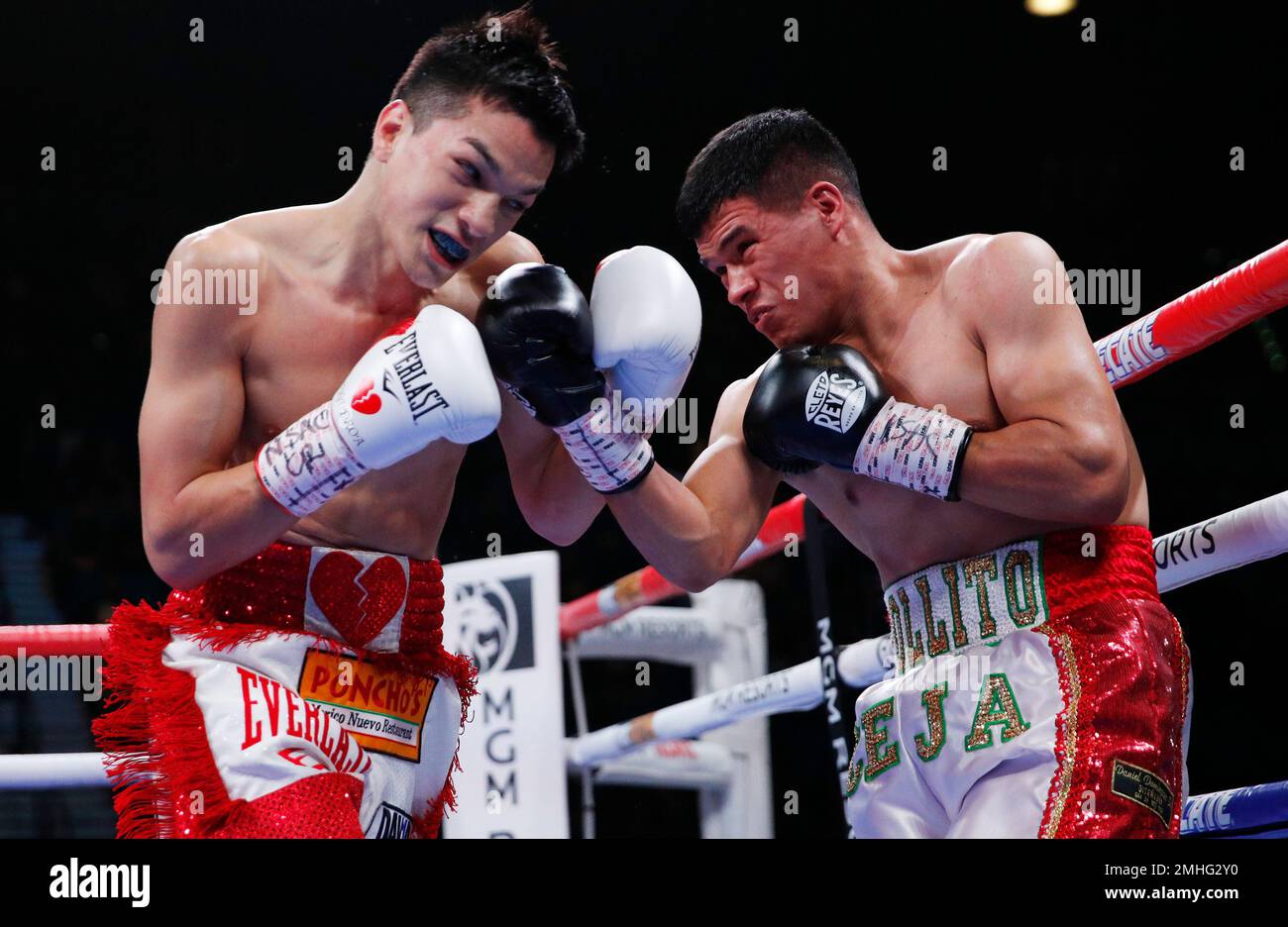 Brandon Figueroa, left, fights Julio Ceja in a super bantamweight ...