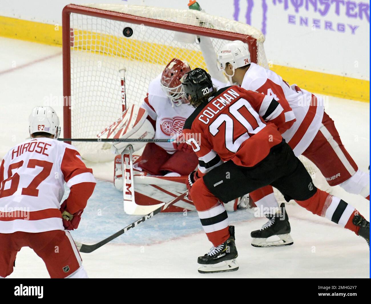 New Jersey Devils center Blake Coleman (20) puts the puck into the nets ...