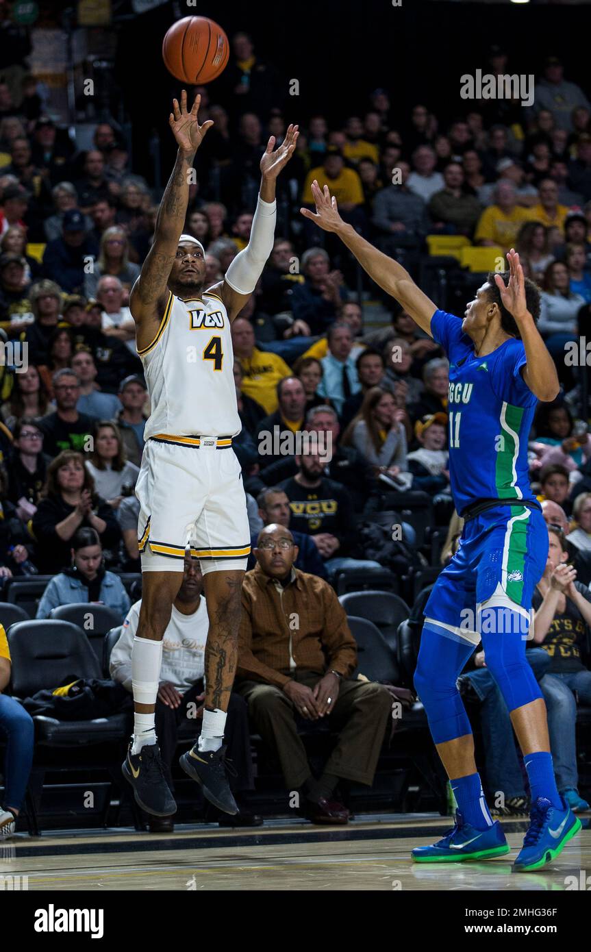 Virginia Commonwealth forward Corey Douglas (4) shoots as Florida Gulf ...