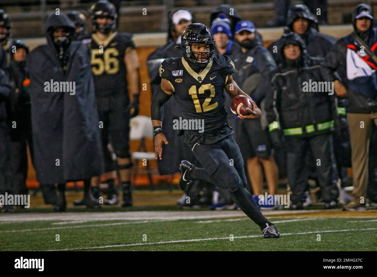Wake Forest quarterback Jamie Newman runs for a 42-yard touchdown ...