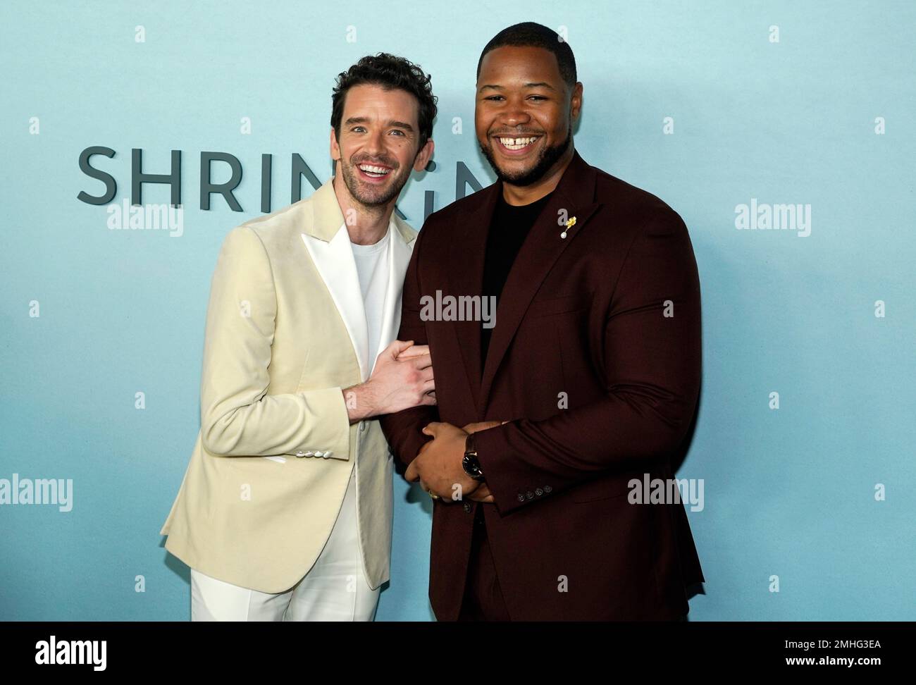 Michael Urie, left, and Luke Tennis pose together at the premiere of ...