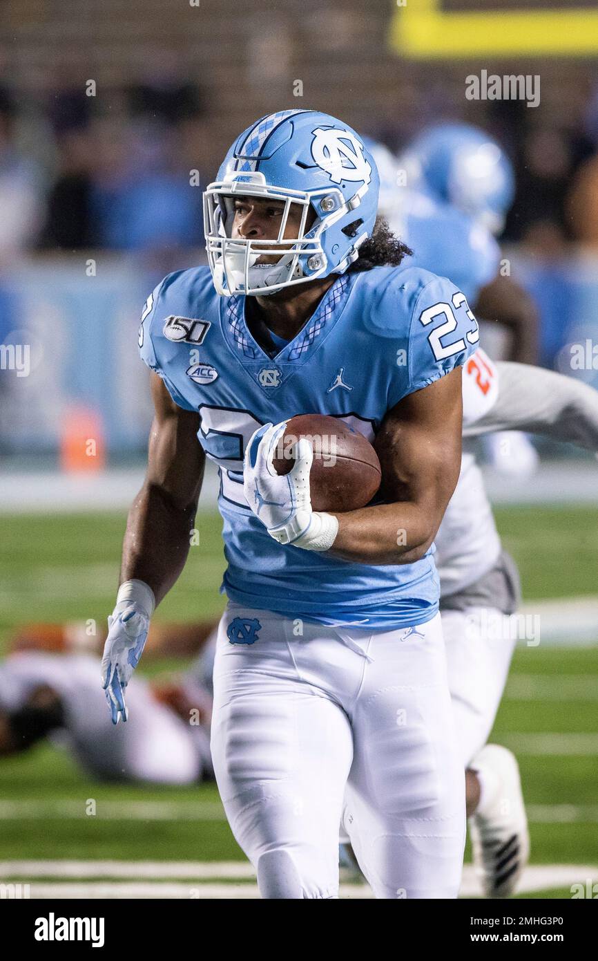North Carolina's Josh Henderson (23) carries the ball during an NCAA ...