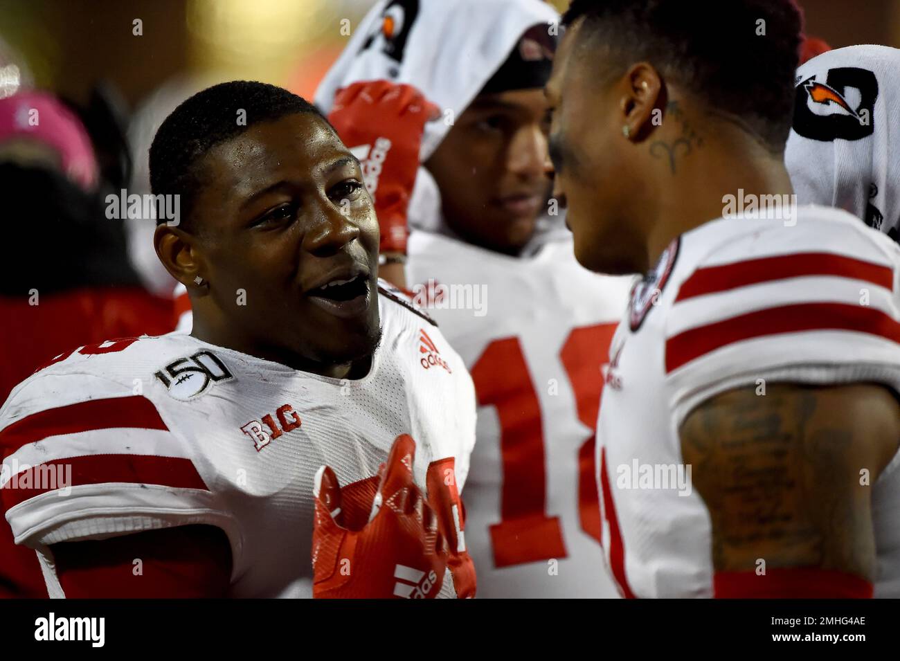 Nebraska running back Dedrick Mills, left, speaks with cornerback Lamar ...