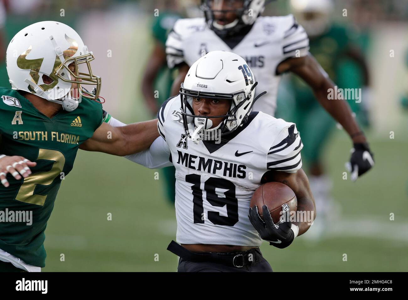 Memphis running back Kenneth Gainwell (19) pushes off South Florida ...
