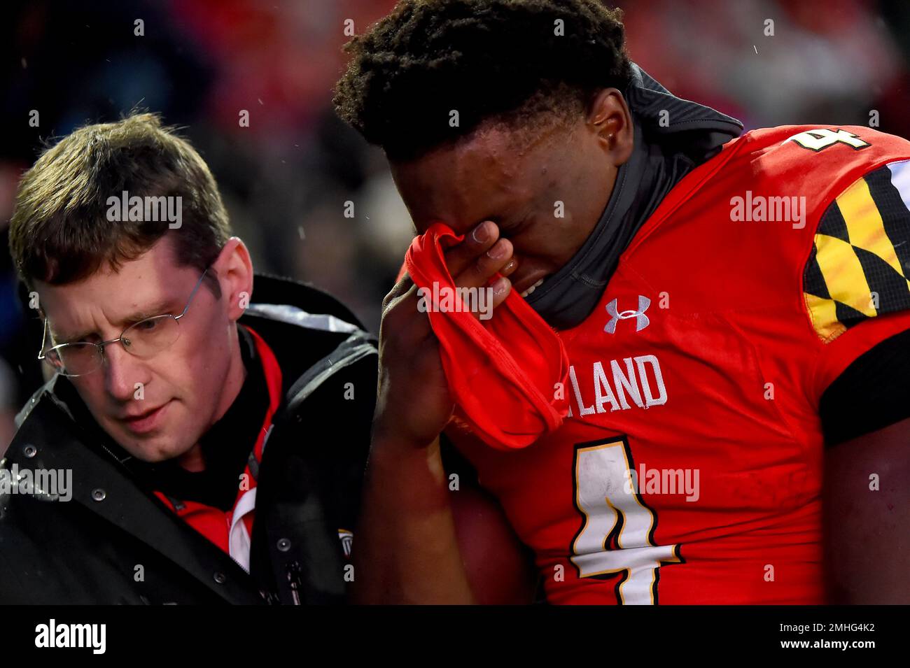 Maryland quarterback Lance LeGendre (4) walks off the field after an ...