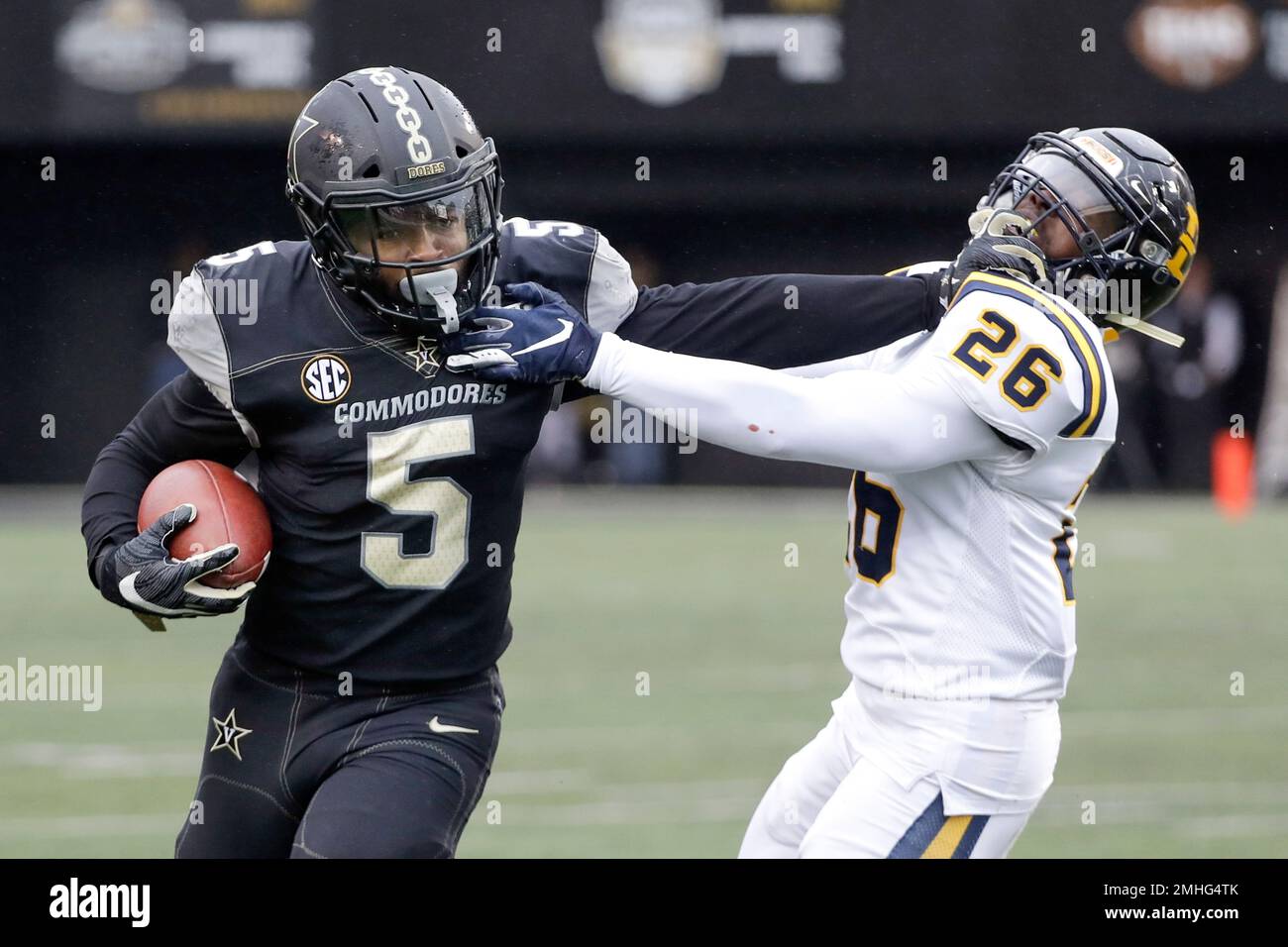 Vanderbilt running back Ke'Shawn Vaughn (5) tries to get past ETSU ...