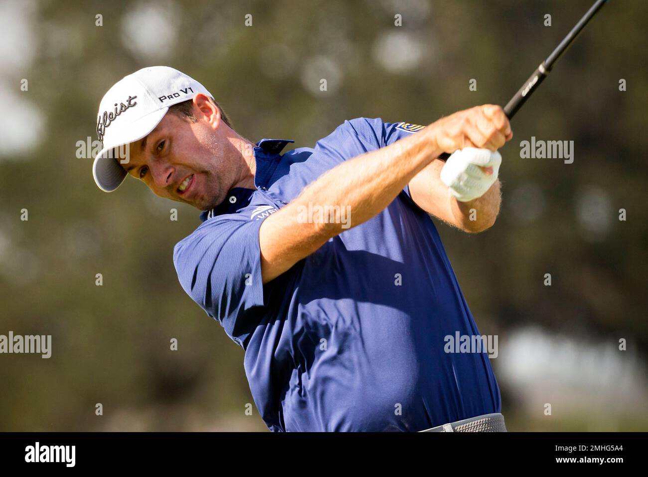 Webb Simpson hits off of the 16th tee during the third round of the RSM ...