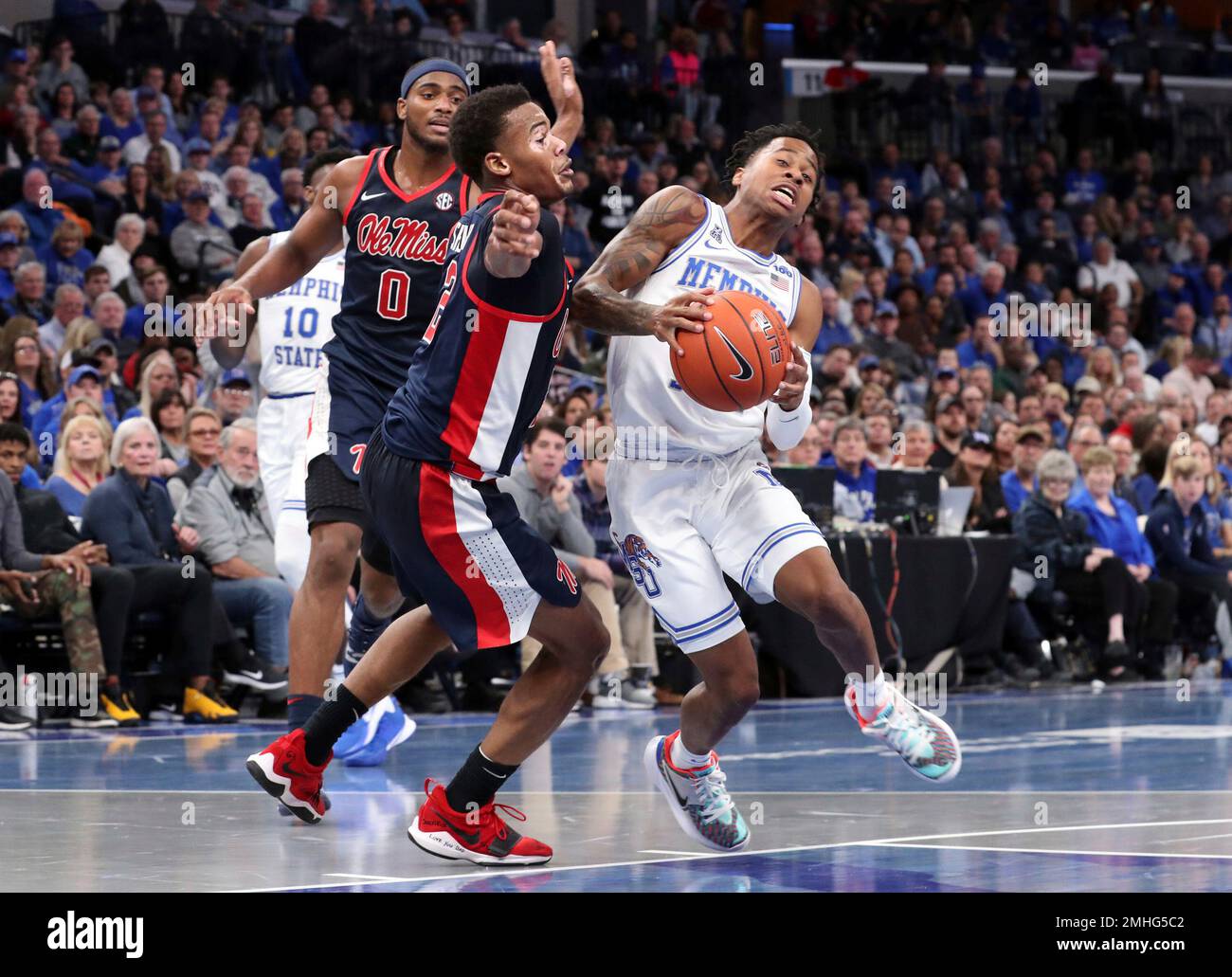 Memphis' Tyler Harris (1) makes his way to the basket as Mississippi's ...
