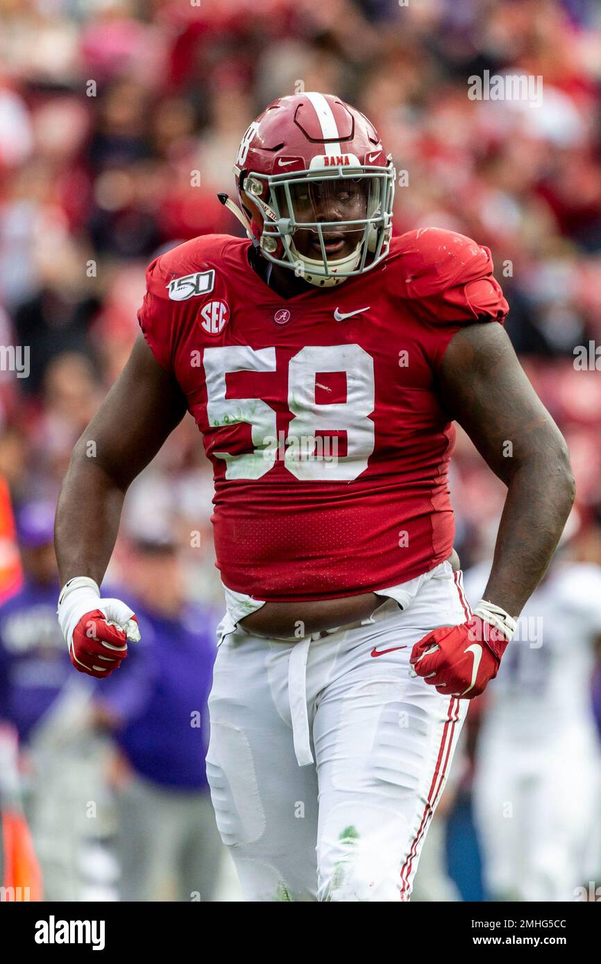 Alabama defensive lineman Christian Barmore (58) celebrates a sack ...