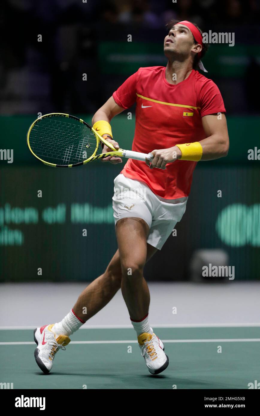 Spain's Rafael Nadal runs for the ball against Great Britain's Daniel ...