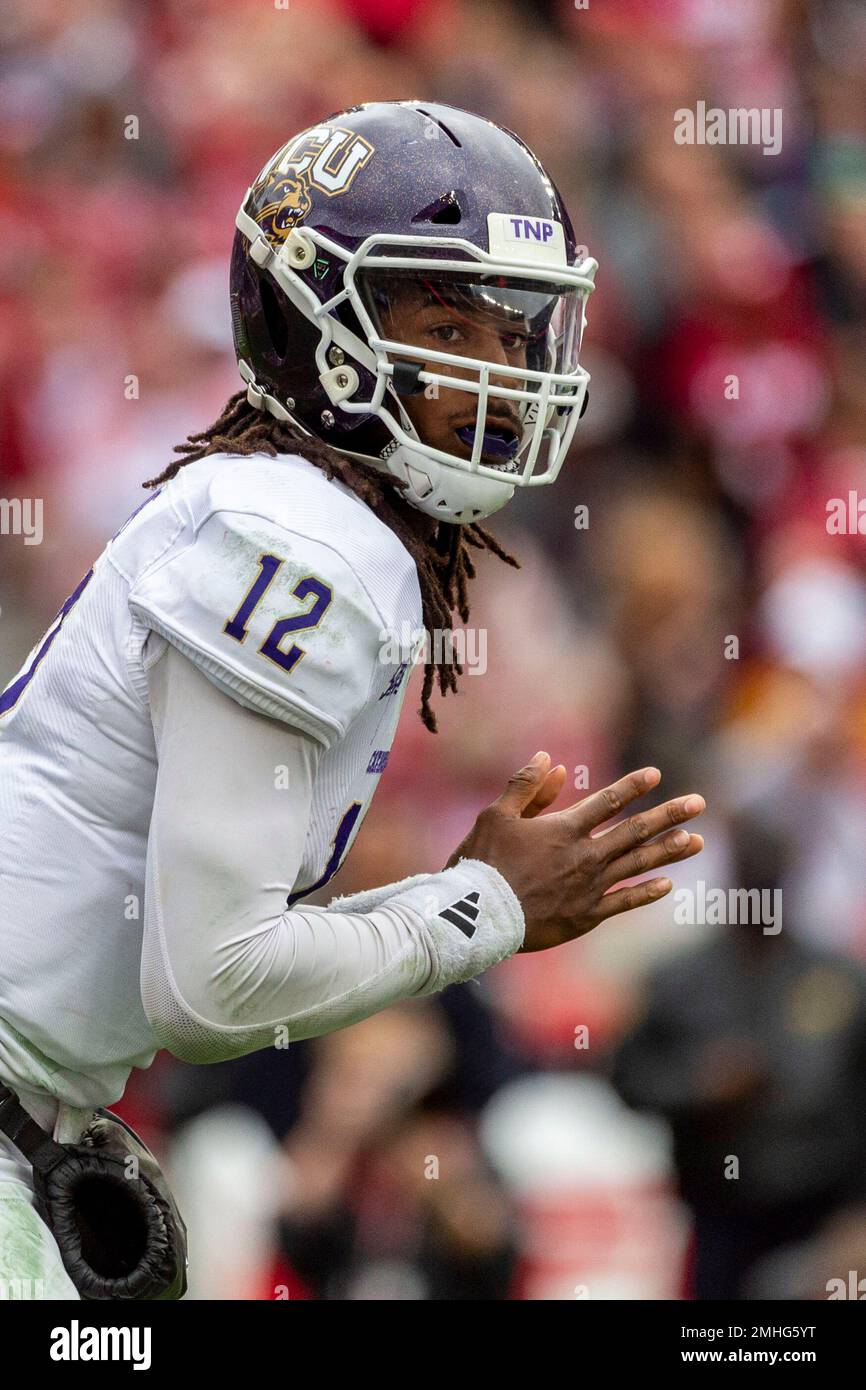 Western Carolina quarterback Tyrie Adams (12) gets set in the shotgun ...