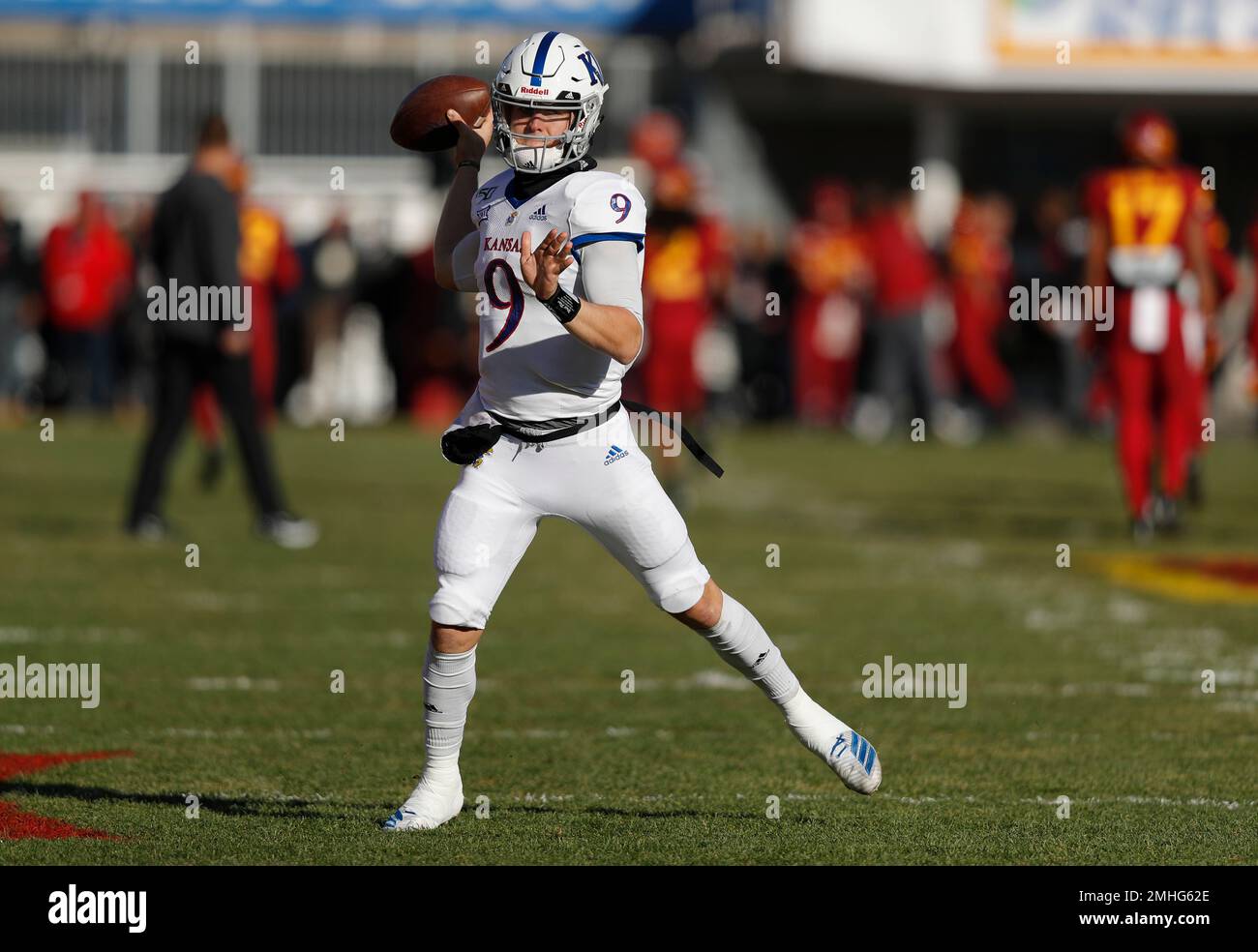 Kansas quarterback Carter Stanley warms up before an NCAA college ...