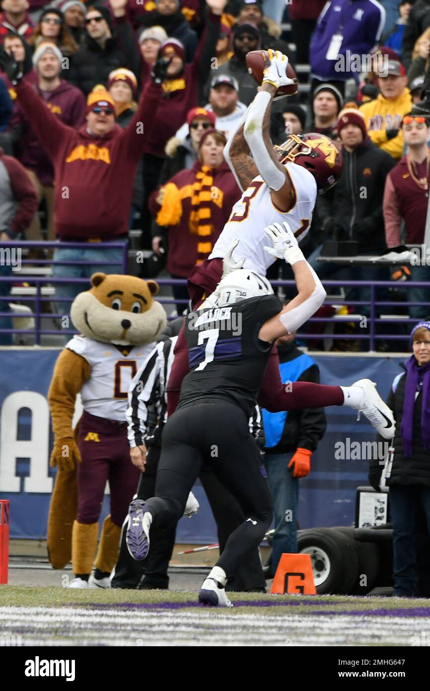 Minnesota wide receiver Rashod Bateman (13) catches a touchdown pass ...