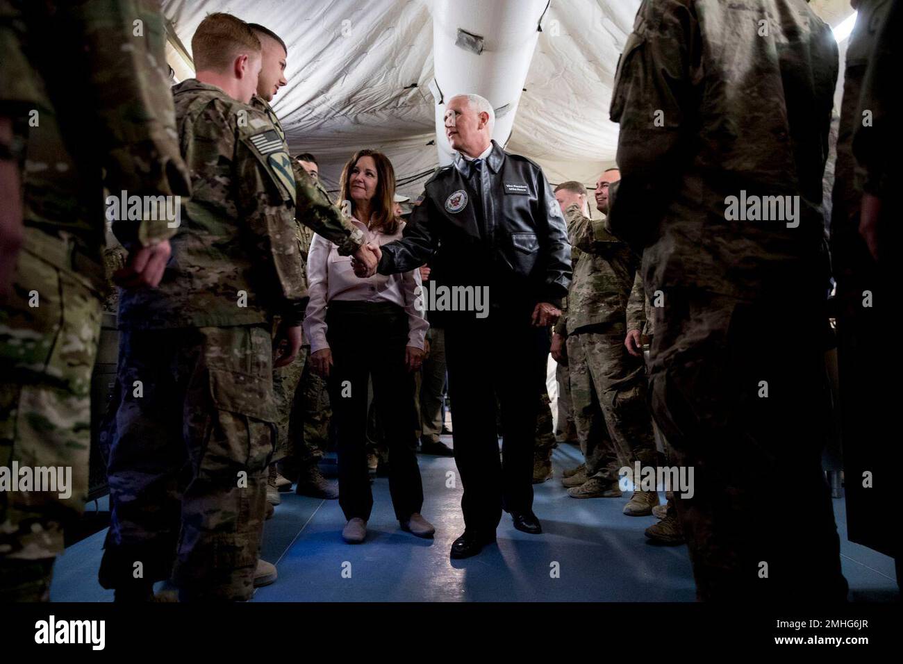 Vice President Mike Pence and his wife Karen Pence greet troops at ...