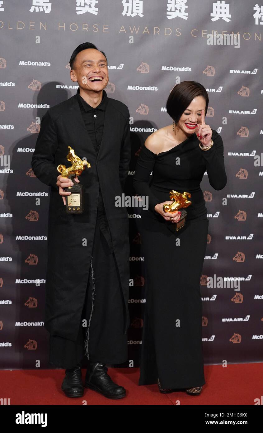 Malaysian actress Yeo Yann-yann, right, and Taiwanese actor Chen Yi-wen hold their awards for ...