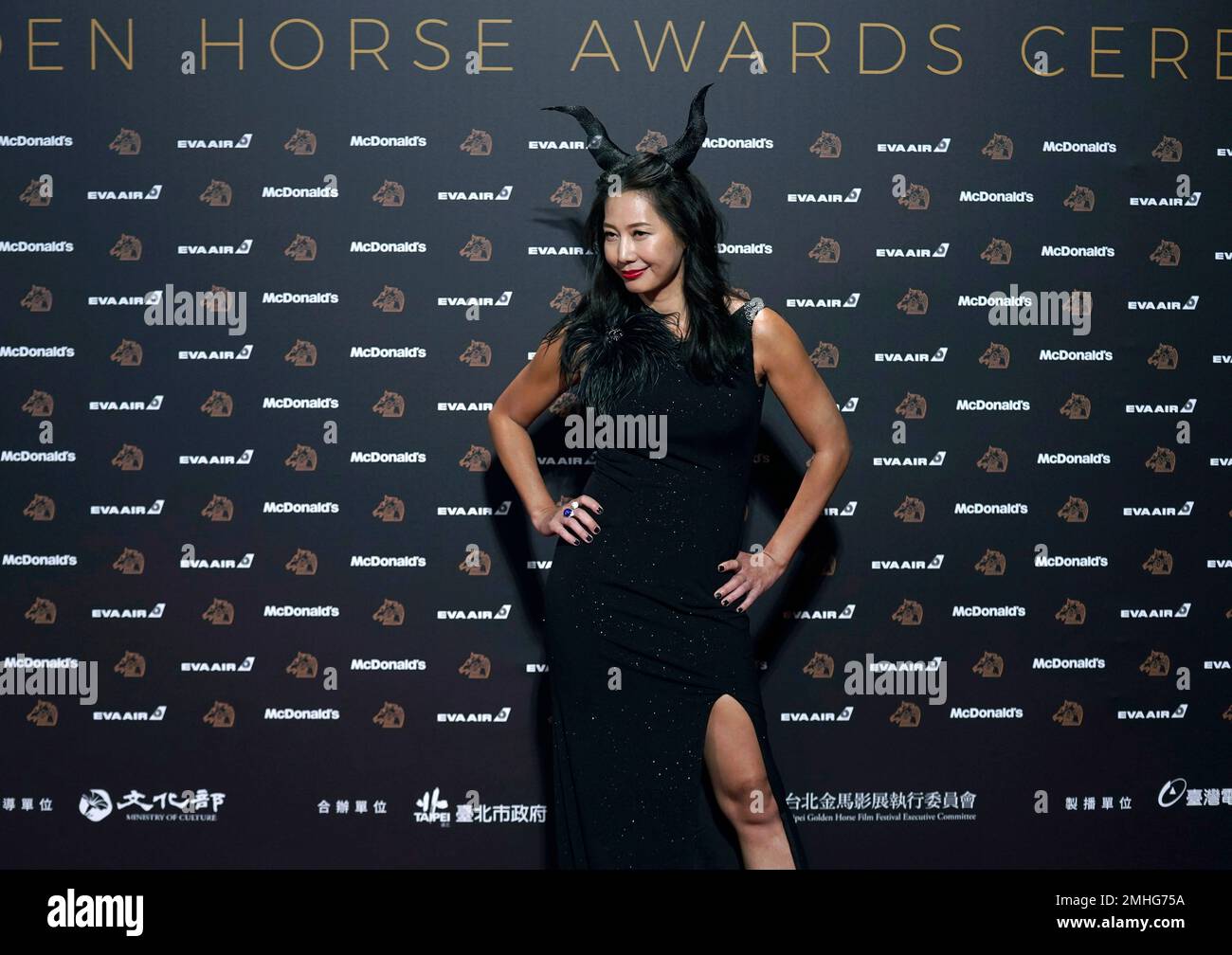 Taiwanese actress Ding Ning poses on the red carpet at the 56th Golden Horse Awards in Taipei ...