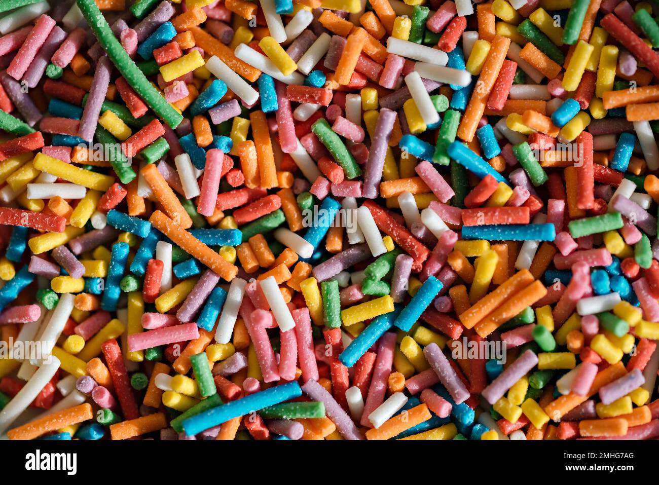 Festive texture background multicolored sweet sprinkles Stock Photo - Alamy