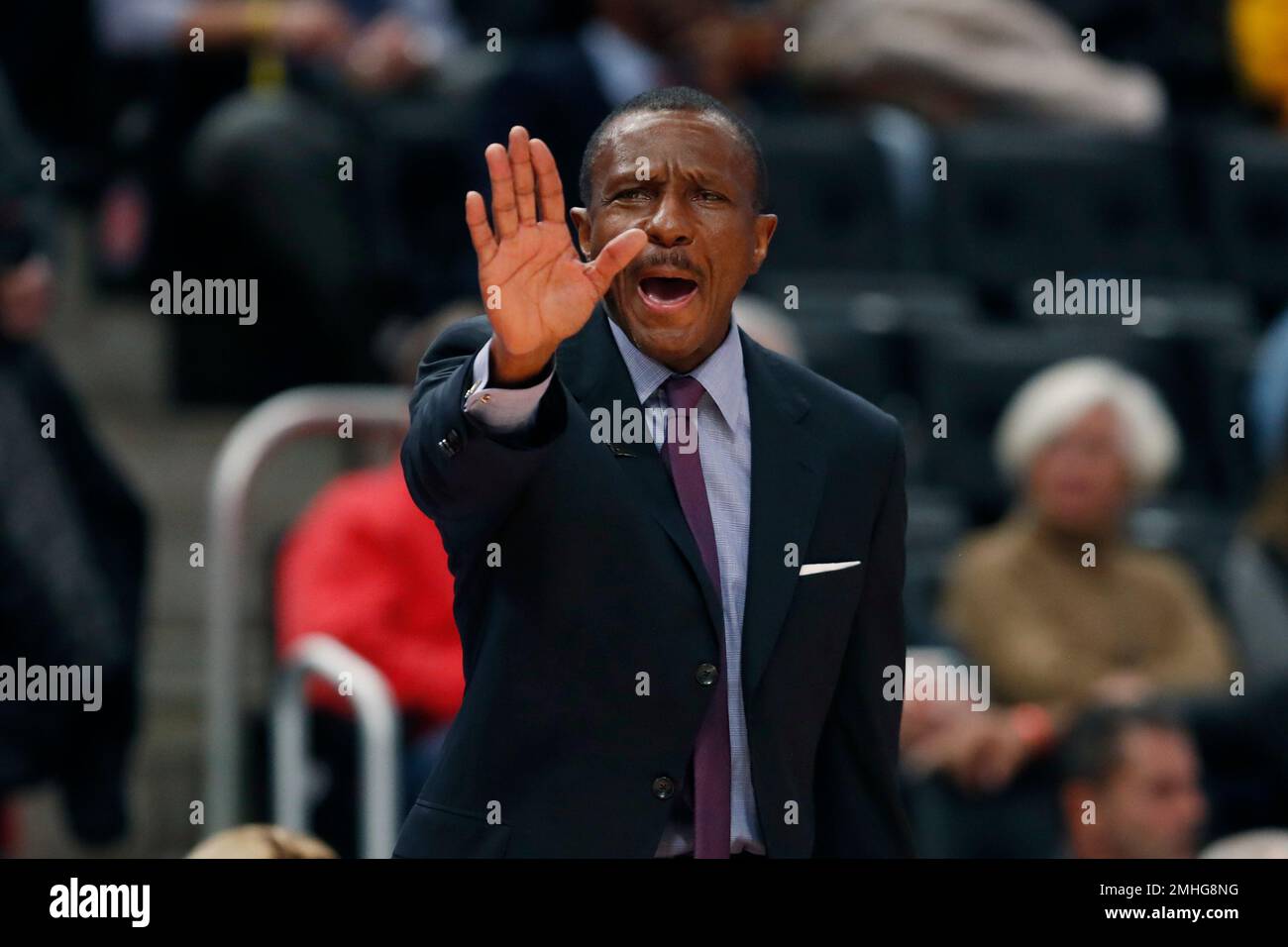 Detroit Pistons head coach Dwane Casey signals from the bench during ...