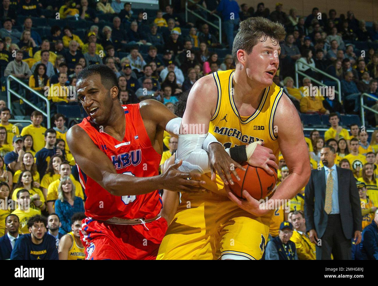 Houston Baptist guard Ian DuBose (0) contests for the ball with ...
