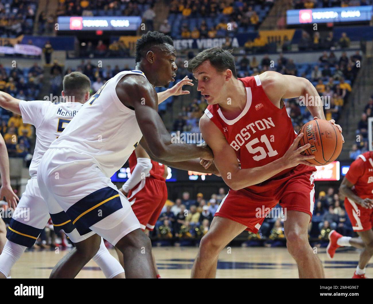 West Virginia forward Oscar Tshiebwe (34) defends against Boston ...