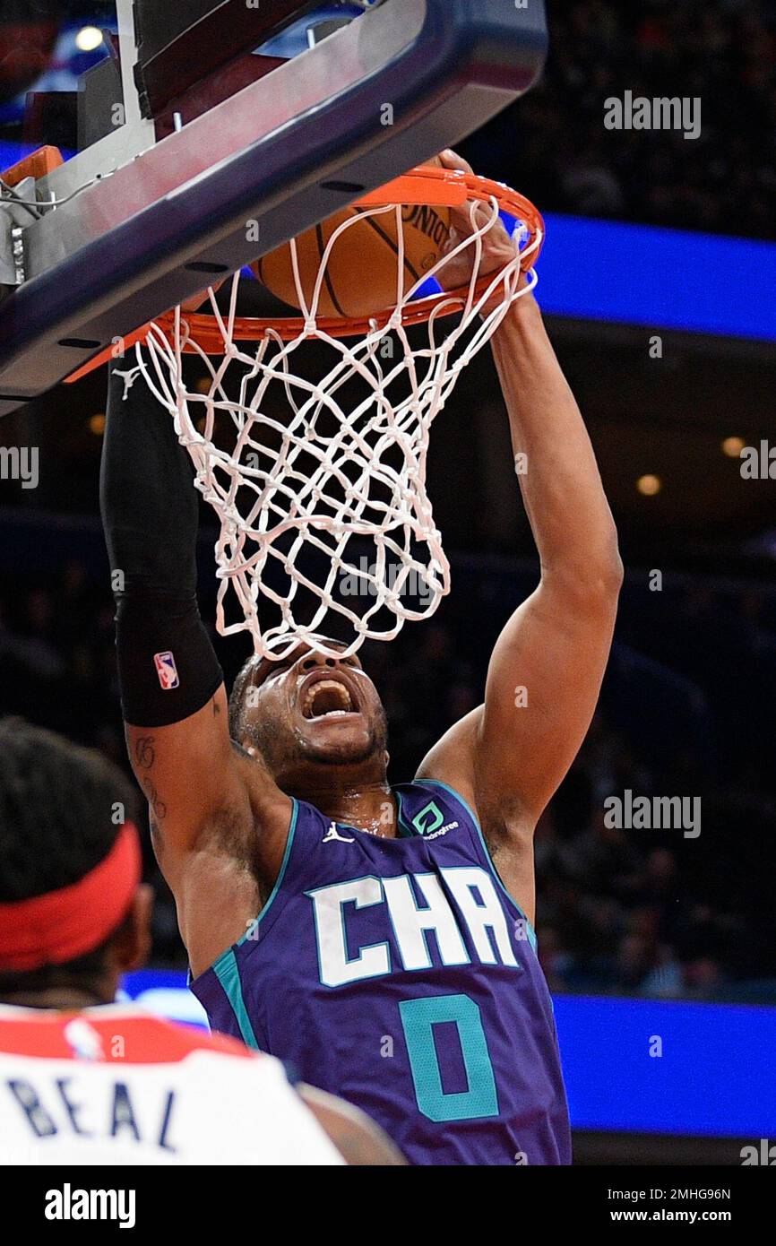 Charlotte Hornets forward Miles Bridges (0) dunks in front of ...