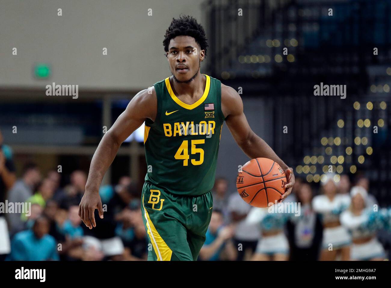 Baylor guard Davion Mitchell (45) dribbles during the second half of an ...