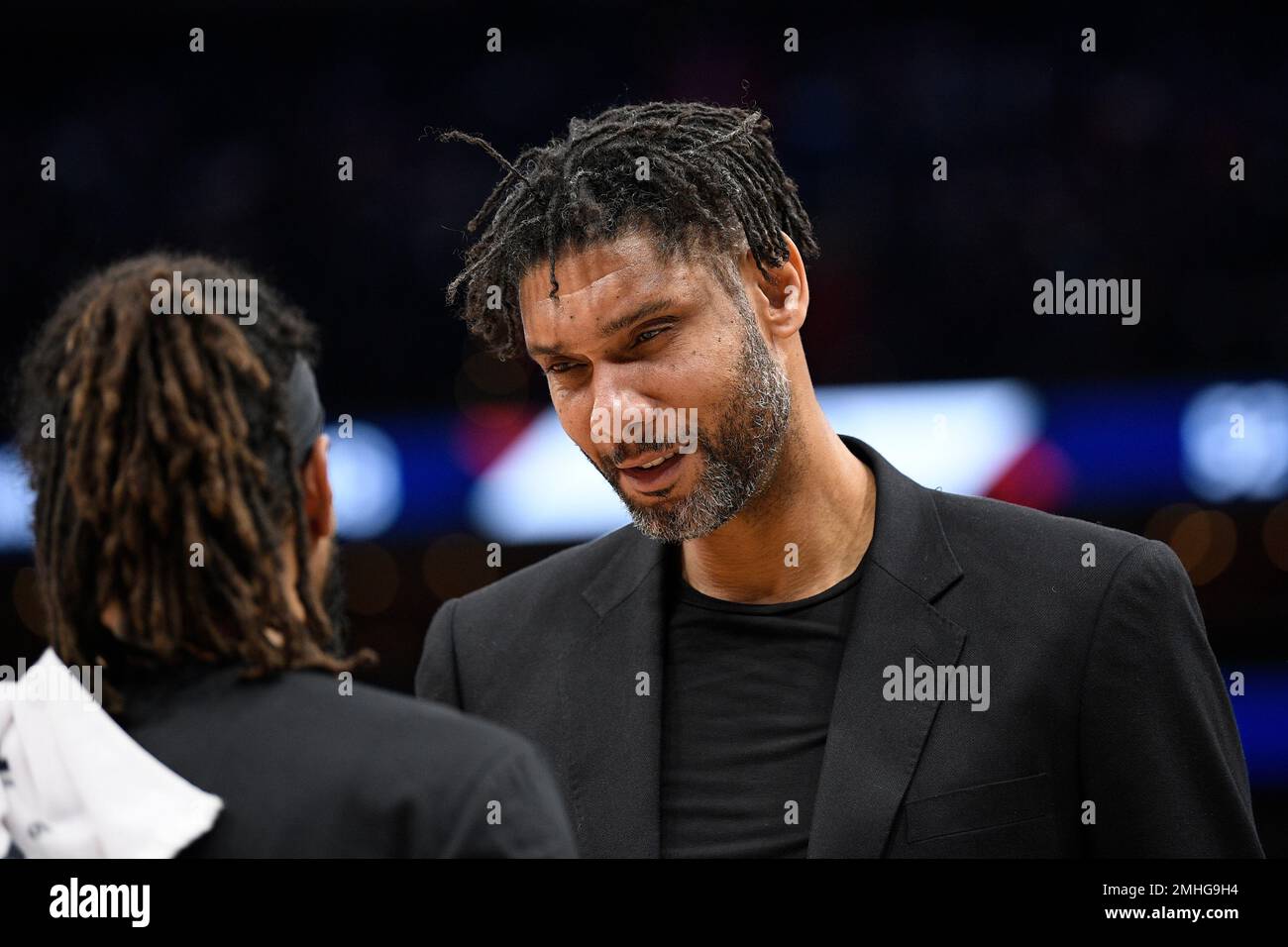 San Antonio Spurs assistant coach Tim Duncan talks with guard Patty ...