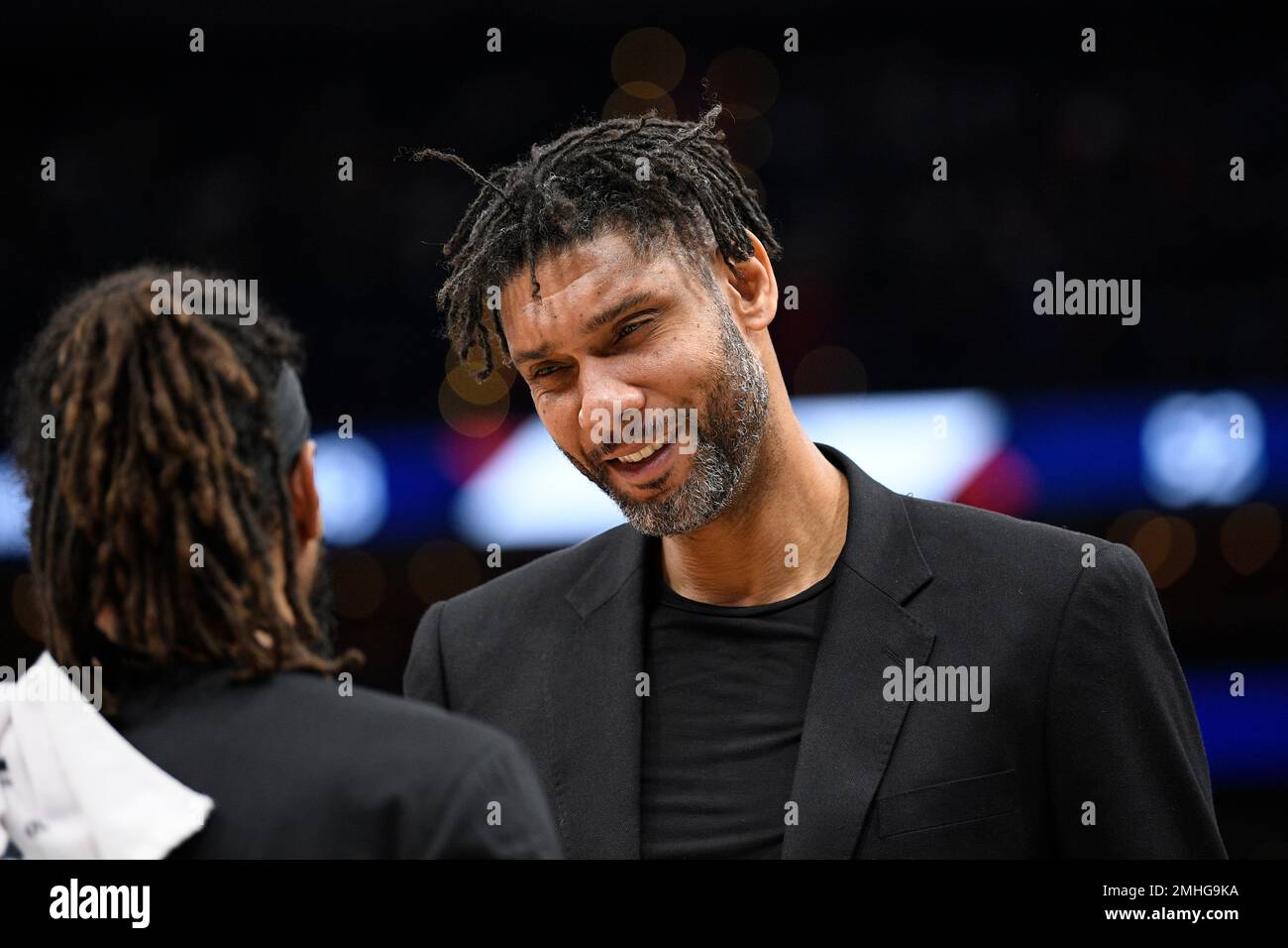San Antonio Spurs assistant coach Tim Duncan talks with guard Patty ...