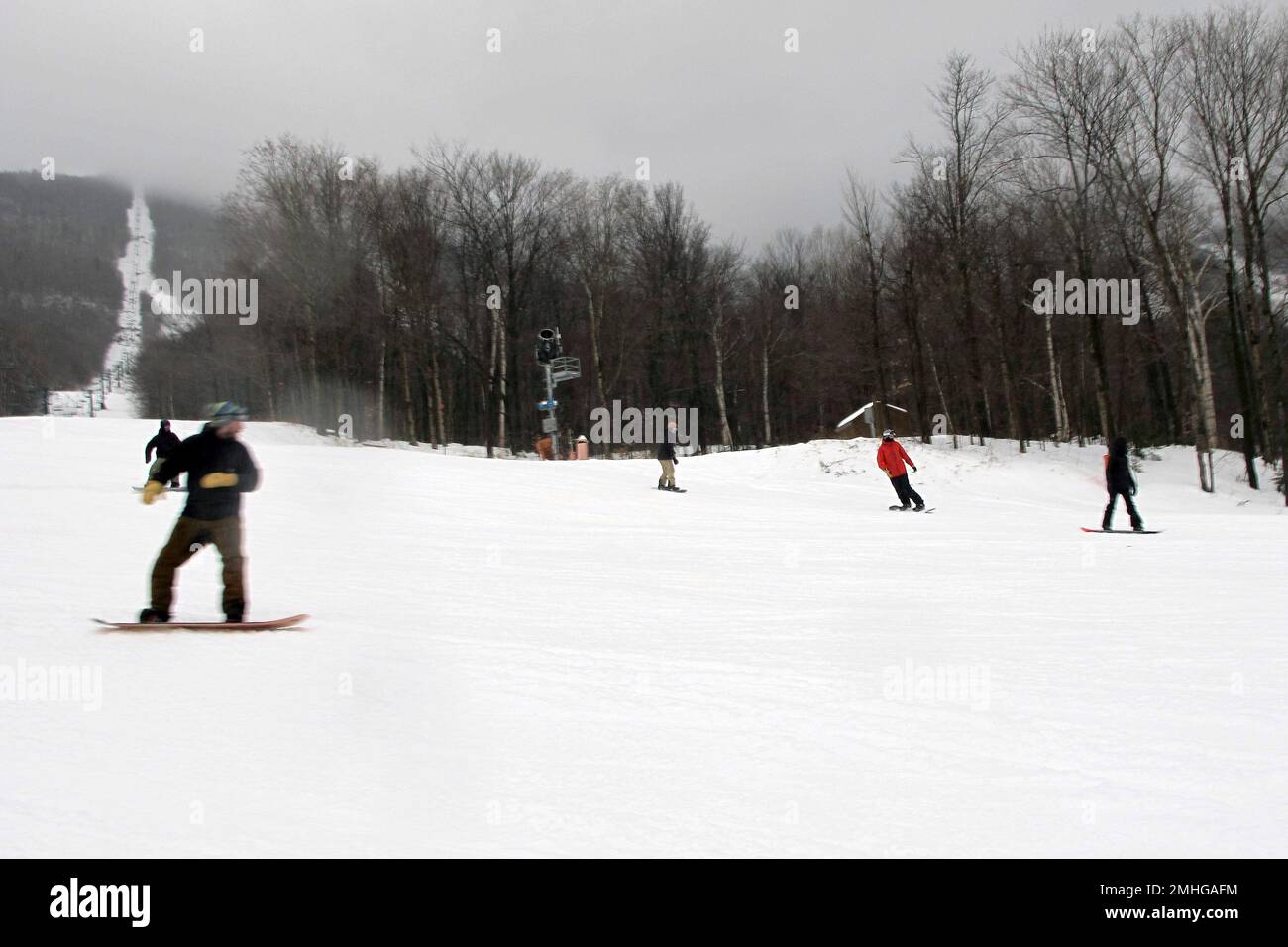 Snowboarders come down the mountain at Stowe Mountain Resort on Friday ...
