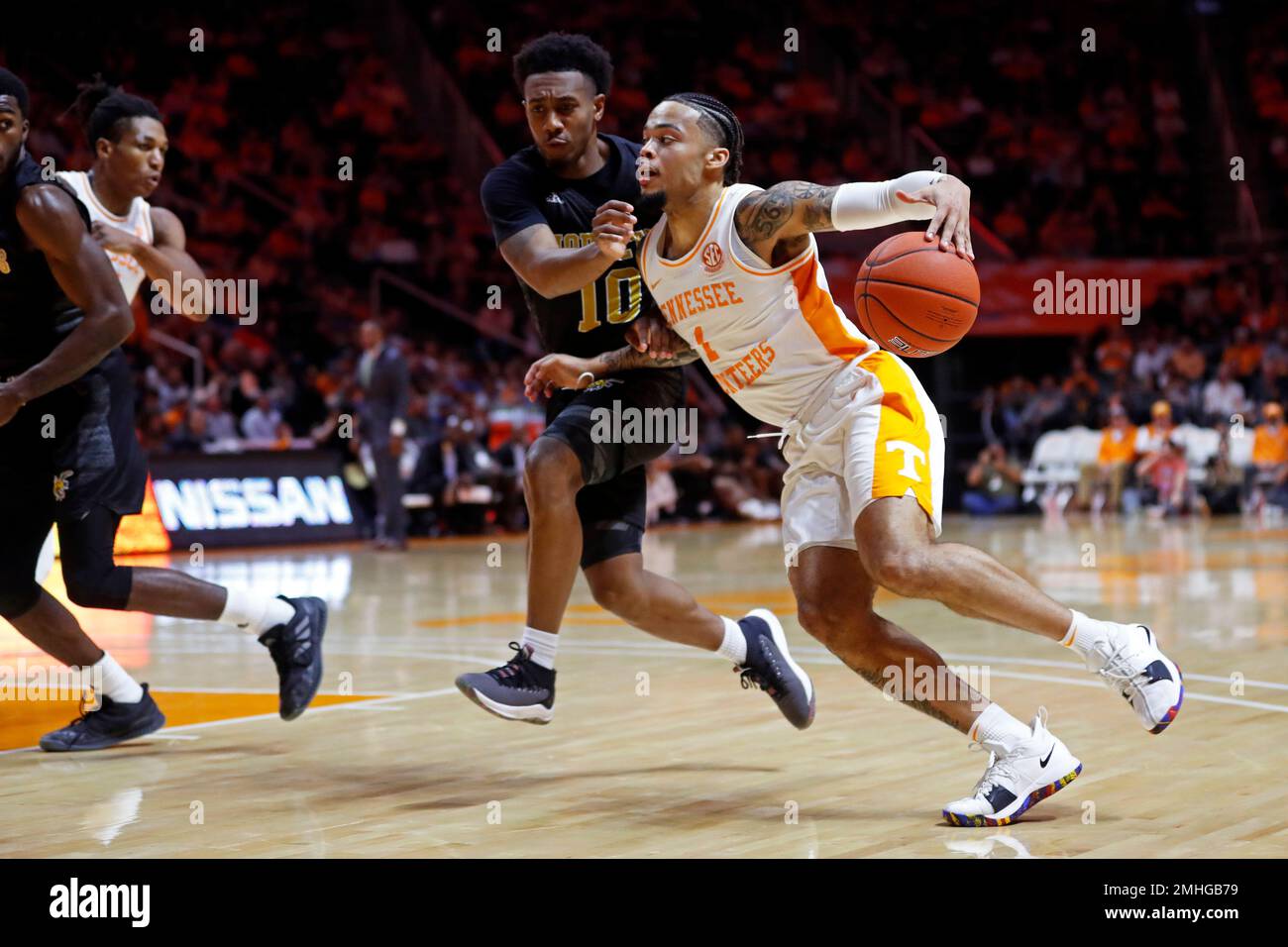 Tennessee guard Lamonte Turner (1) drives against Alabama State guard ...
