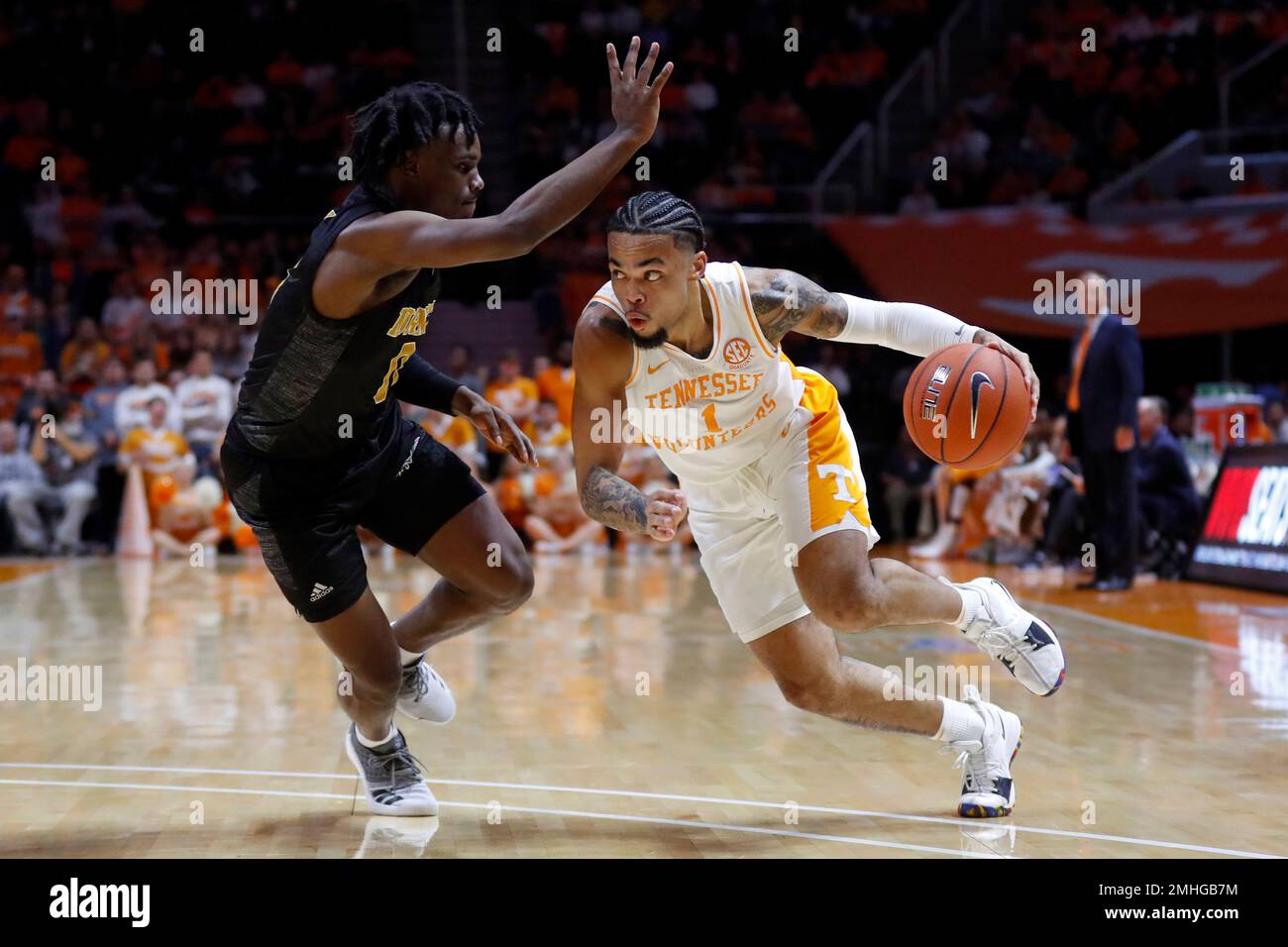 Tennessee guard Lamonte Turner (1) drives against Alabama State guard D ...