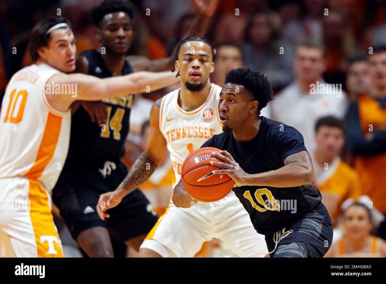 Alabama State guard Jacoby Ross (10) passes the ball as he's defended ...