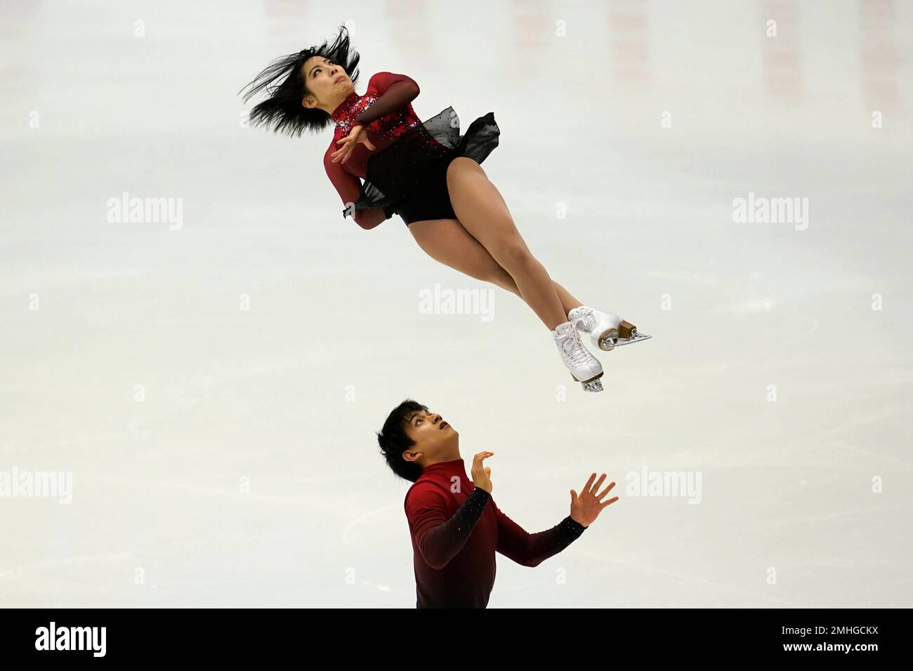 Riku Miura and Ryuichi Kihara of Japan perform in the pairs short ...