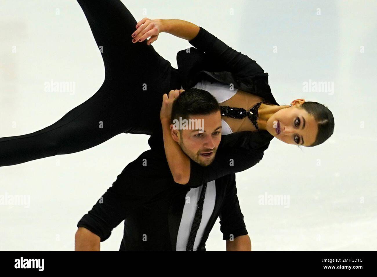 Lilah Fear and Lewis Gibson of Britain perform in the ice dance rhythm ...