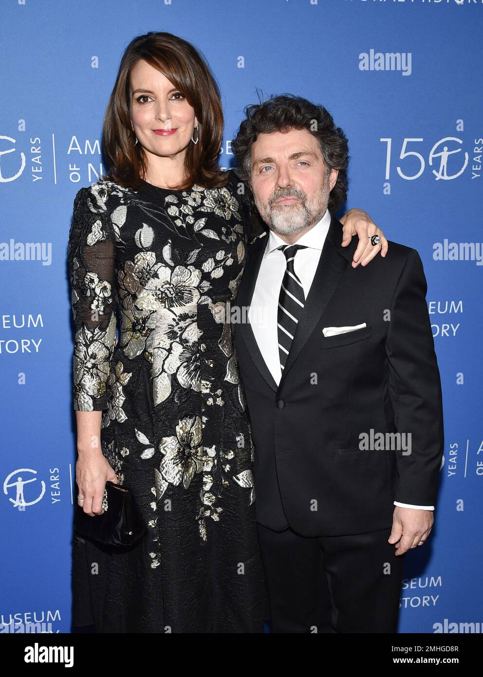 Actress Tina Fey, left, and husband Jeff Richmond attend the American ...