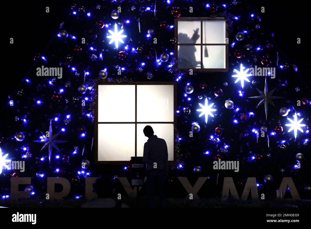 In this Wednesday, Nov. 20, 2019, file photo, a man looks at a ...