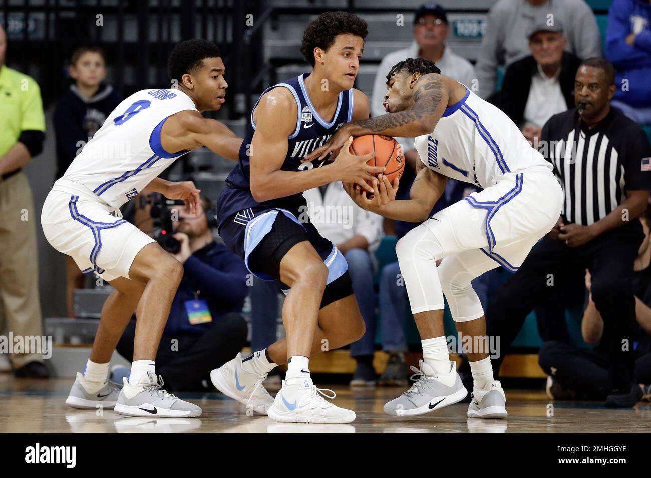 Middle Tennessee State guard Anthony Crump (0) and forward Tyler Millin ...