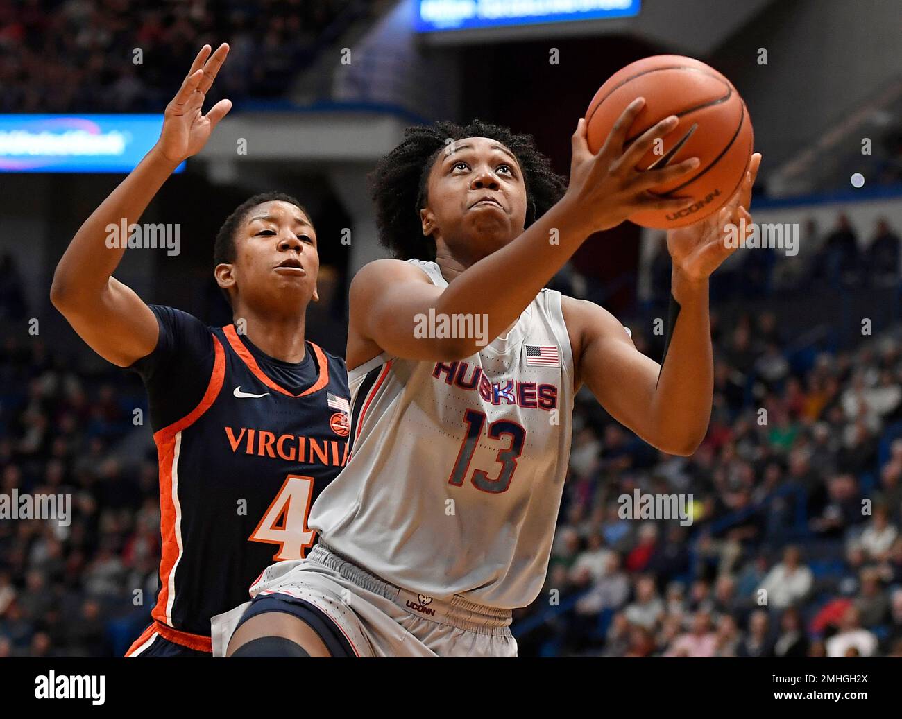 Connecticut's Christyn Williams shoots as Virginia's Dominique ...