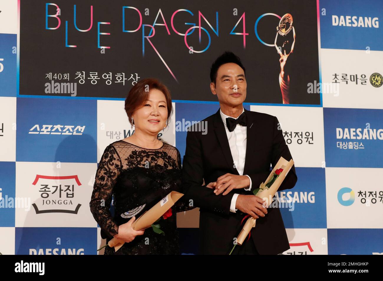 Hong Kong actor Simon Yam, right, and South Korean actress Kim Hye-sook ...