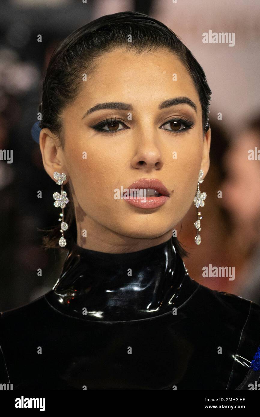 Actress Naomi Scott poses for photographers upon arrival at the ...