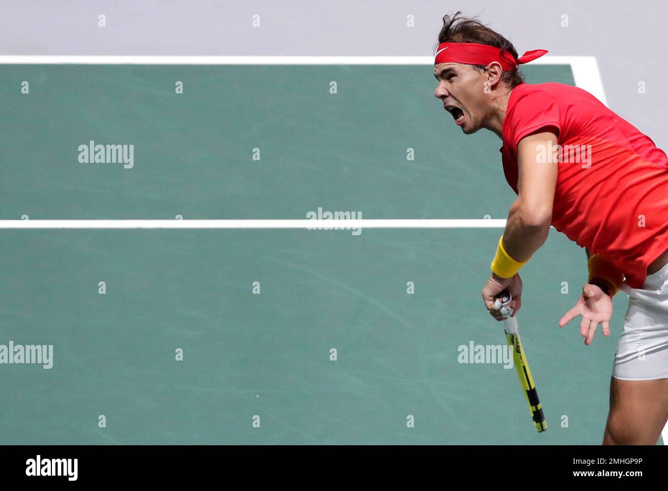 Spain's Rafael Nadal returns servers to Croatia's Borna Gojo during ...