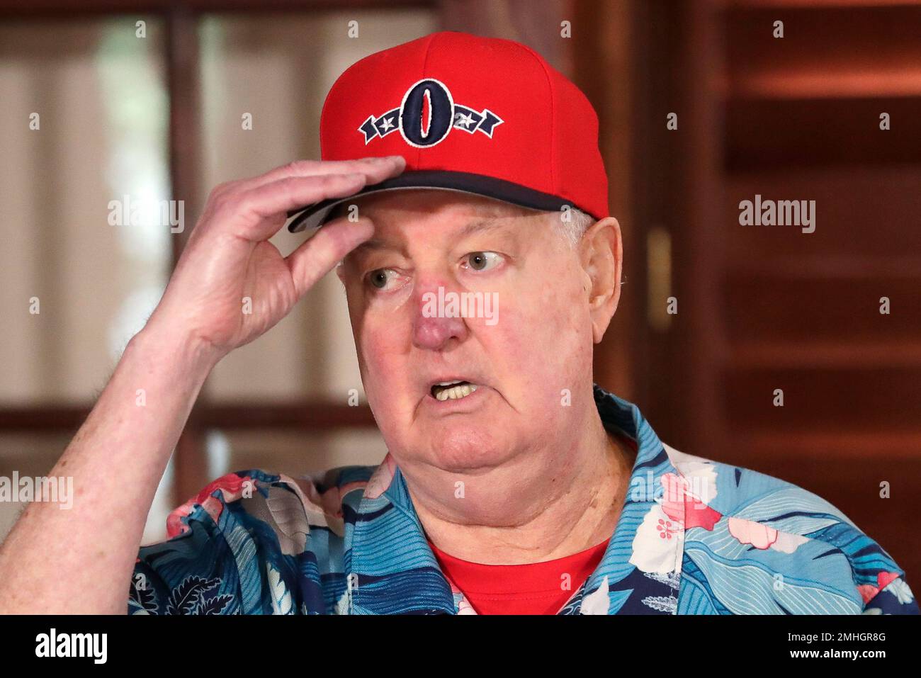 Pat Williams, co-founder of the NBA Orlando Magic basketball team, puts ...