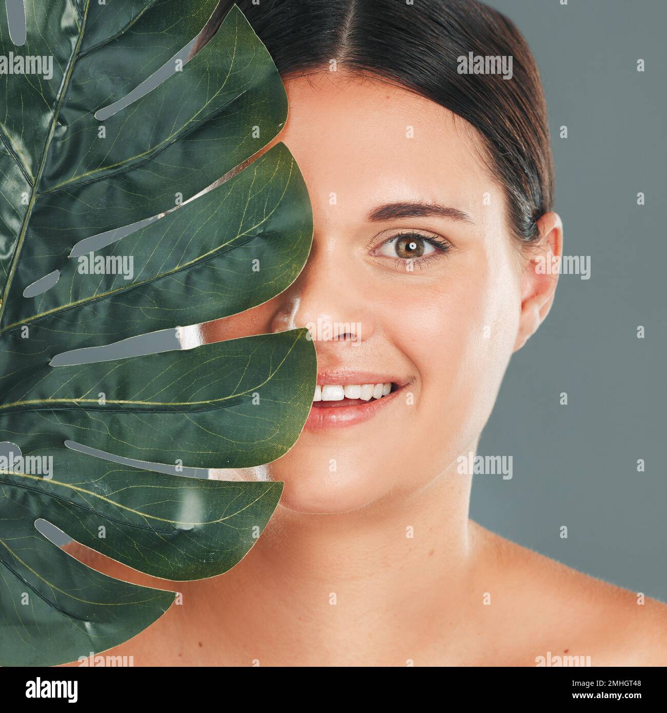 Palm leaf, face and woman in portrait with smile, beauty and skincare ...