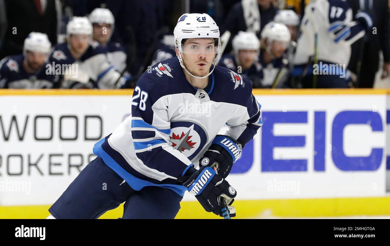 Winnipeg Jets center Jack Roslovic plays against the Nashville ...
